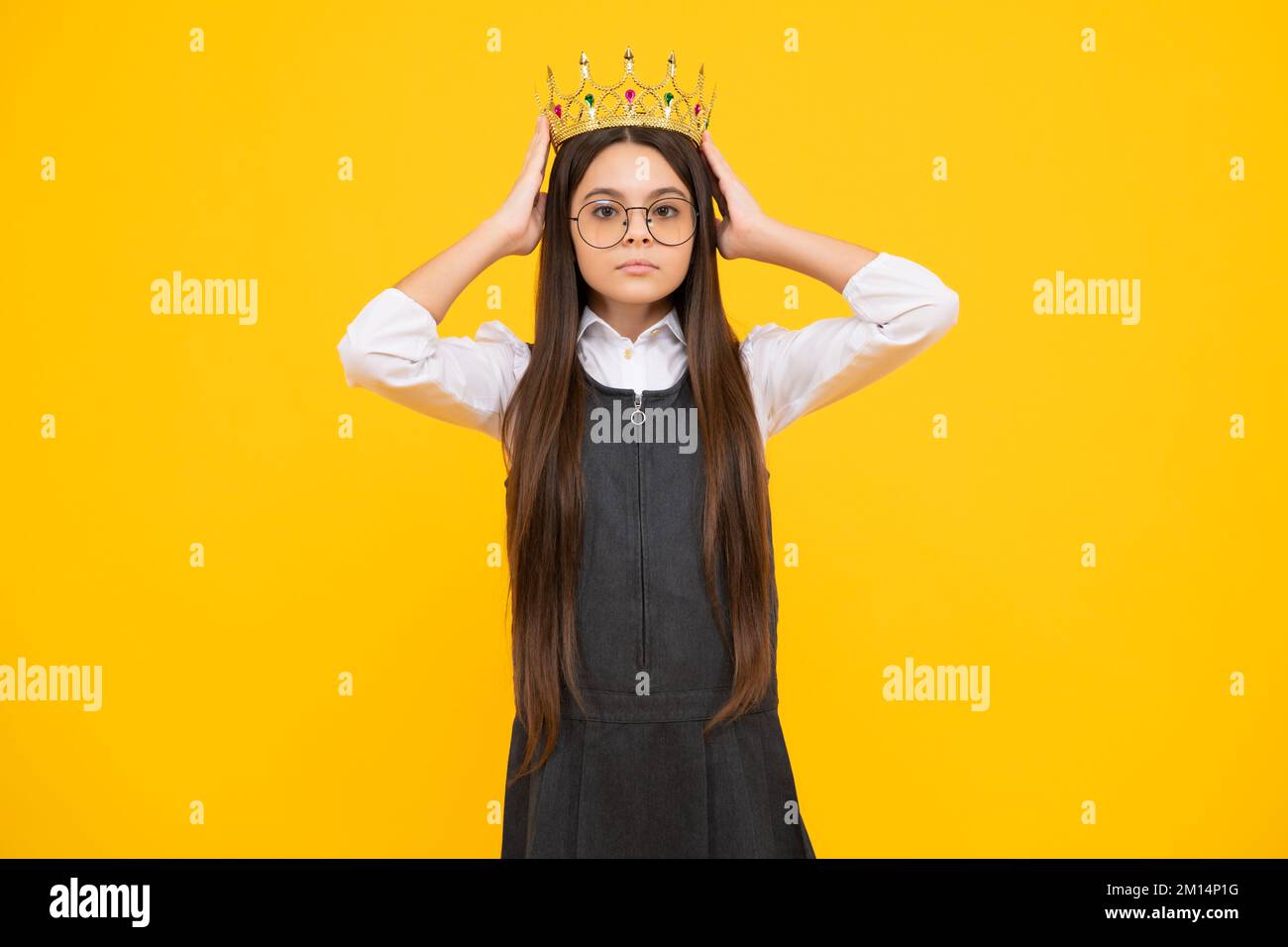 Portrait of ambitious teenage girl with crown, feeling princess ...