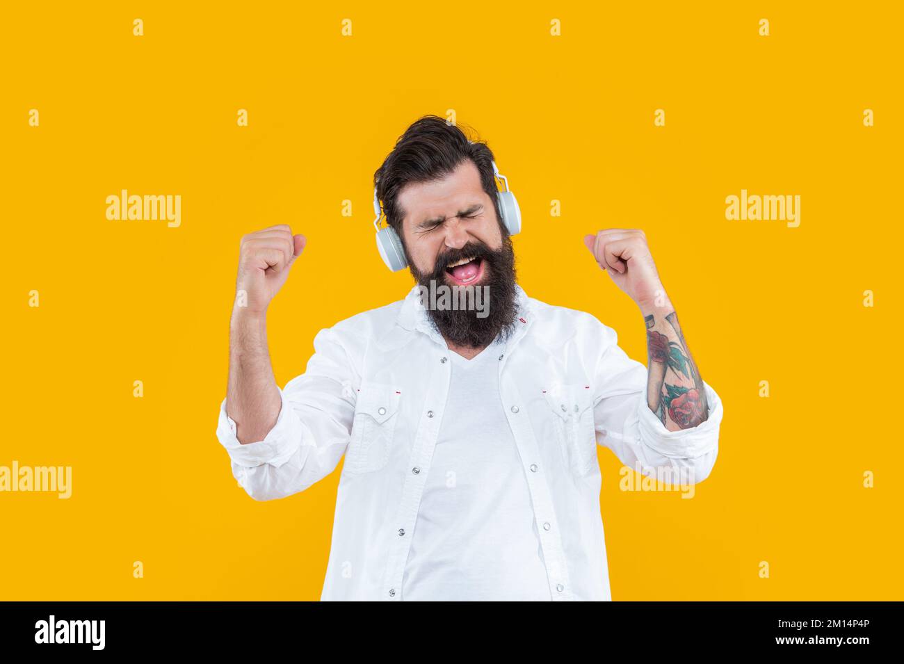 music in headphones of shouting man dj. have fun. dj man in music ...