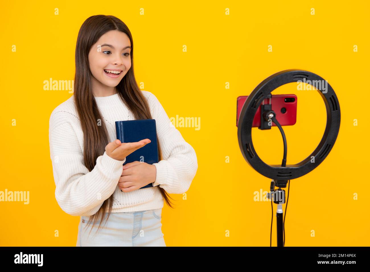 Teenage school girl blogger making video, child vlogger influencer ...