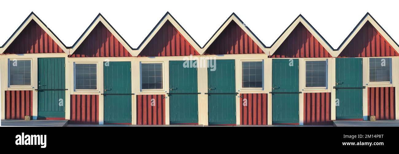 front view of beach cabins in Sweden aligned under white background ...