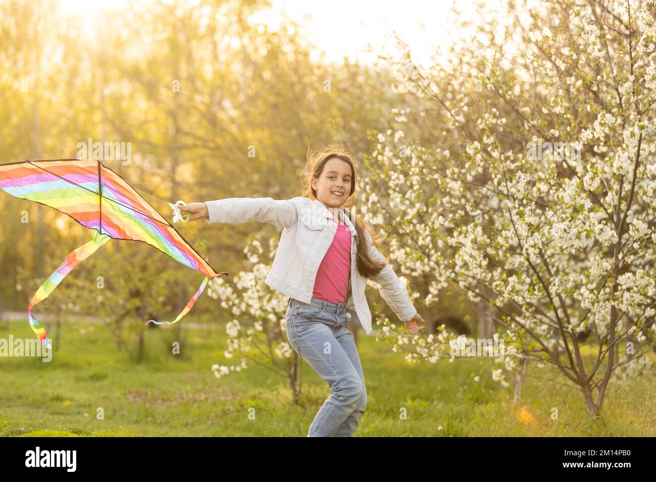 little girl with a kite in the spring. Childhood, Children's Day Stock ...