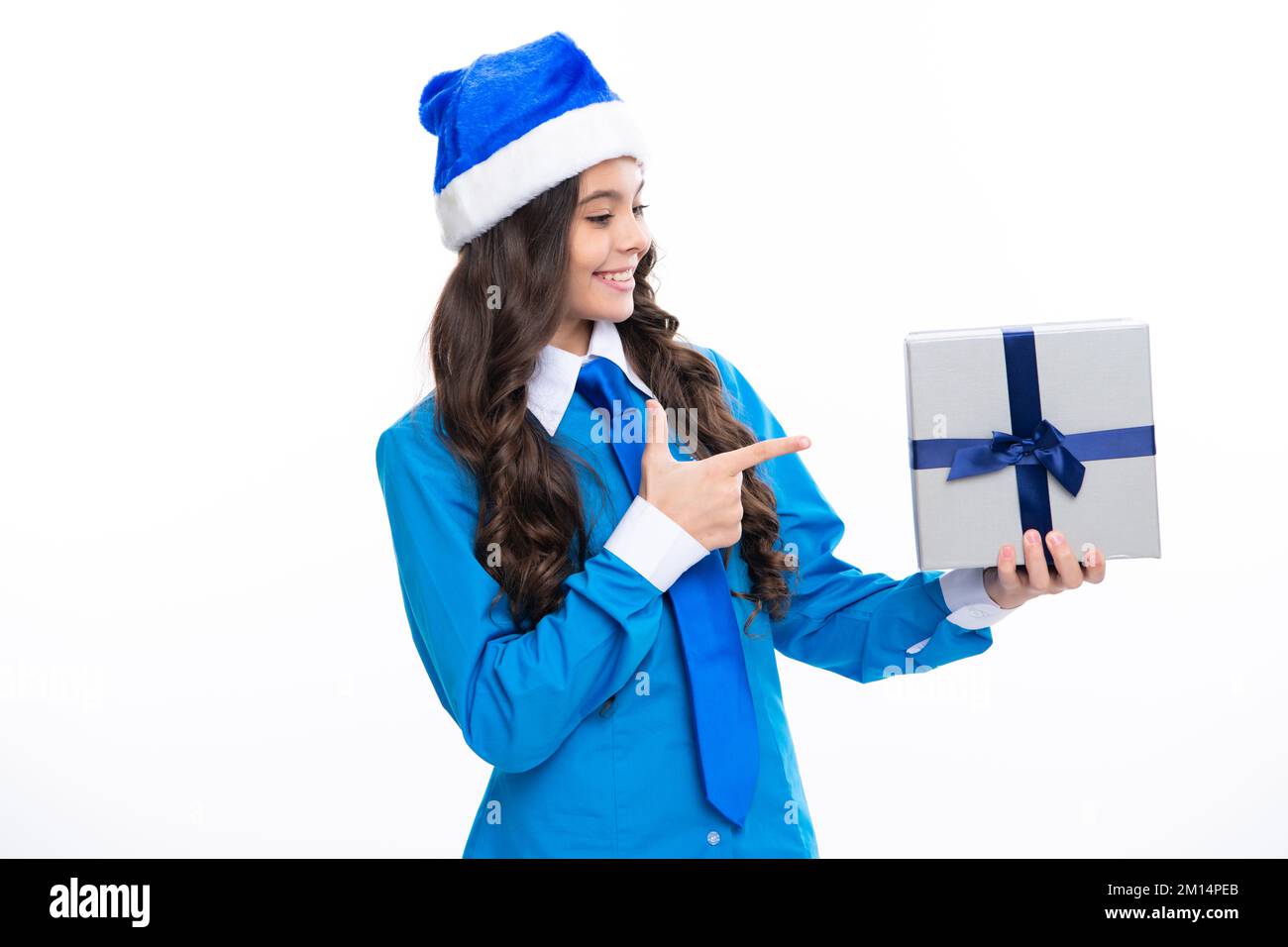 Teenager child with gift box, studio isolated background. Present for ...