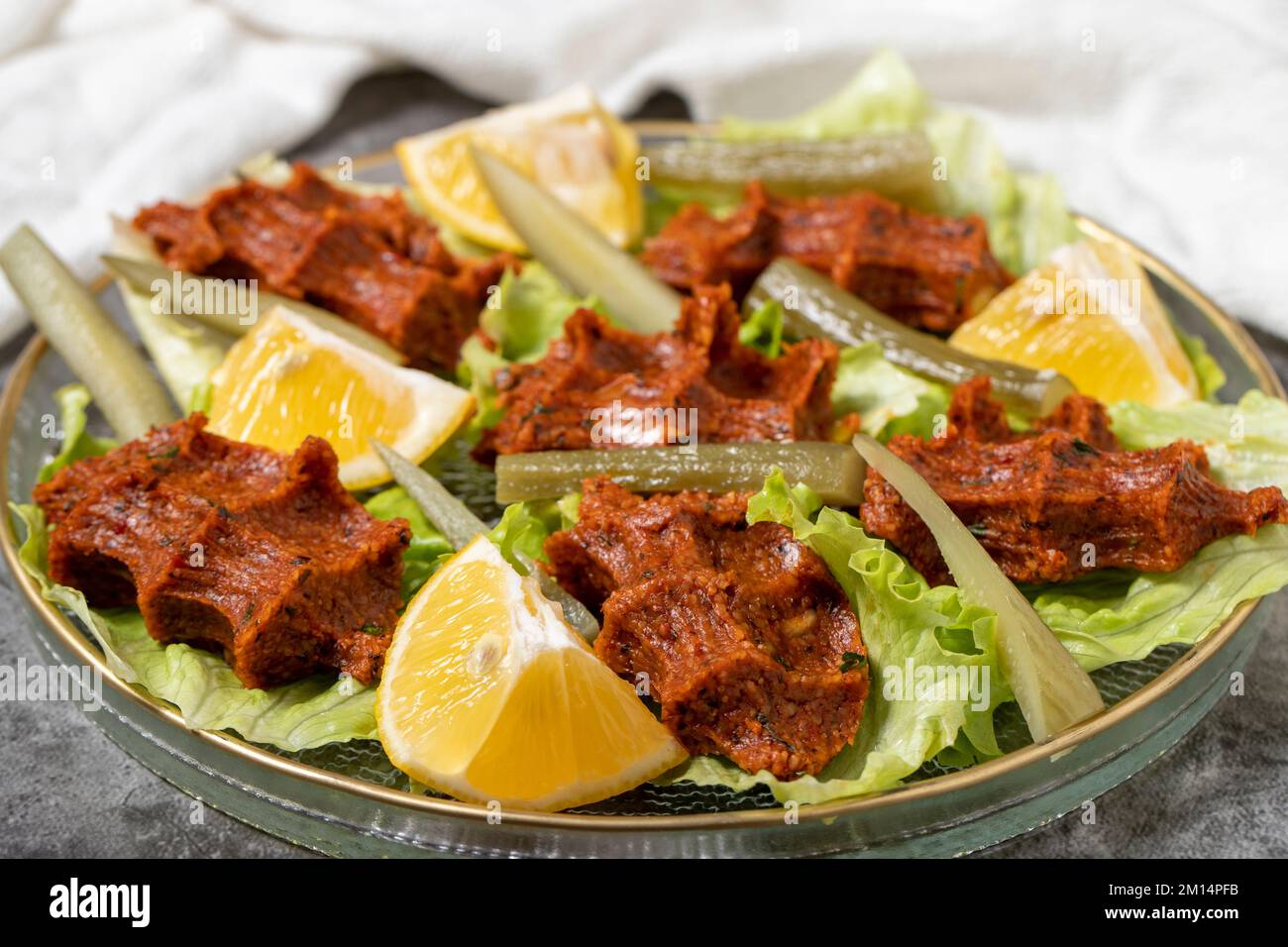 Raw meatballs (cig kofte) on dark background. Turkish cuisine ...