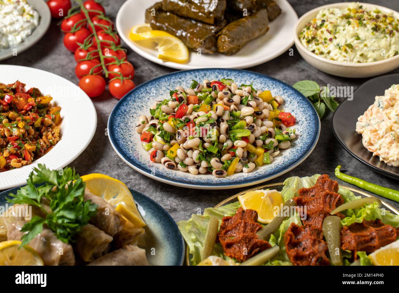Traditional Turkish and Greek dinner appetizer table. Mediterranean ...