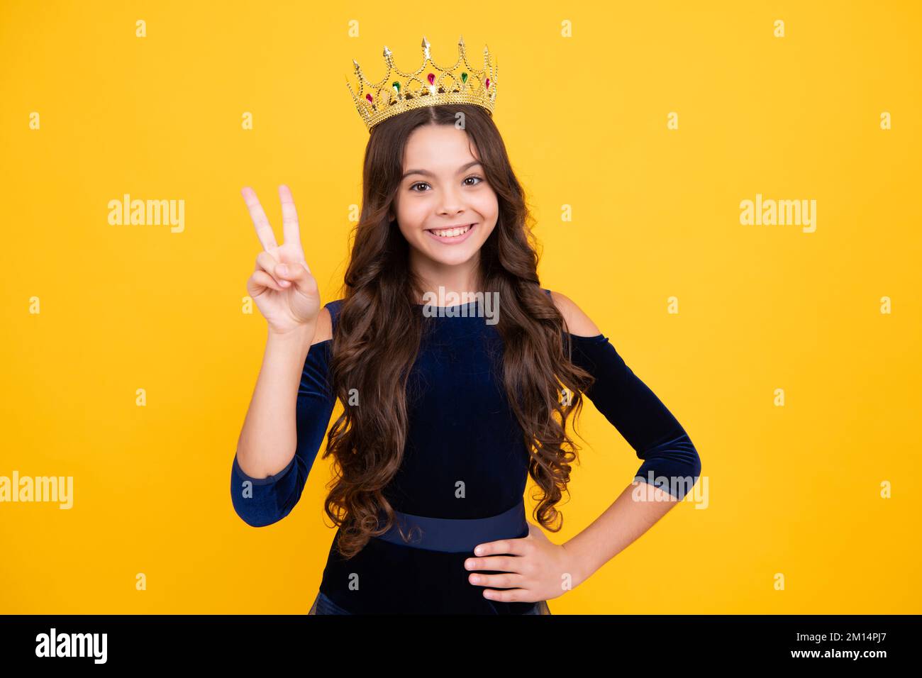 Portrait of ambitious teenage girl with crown, feeling princess ...