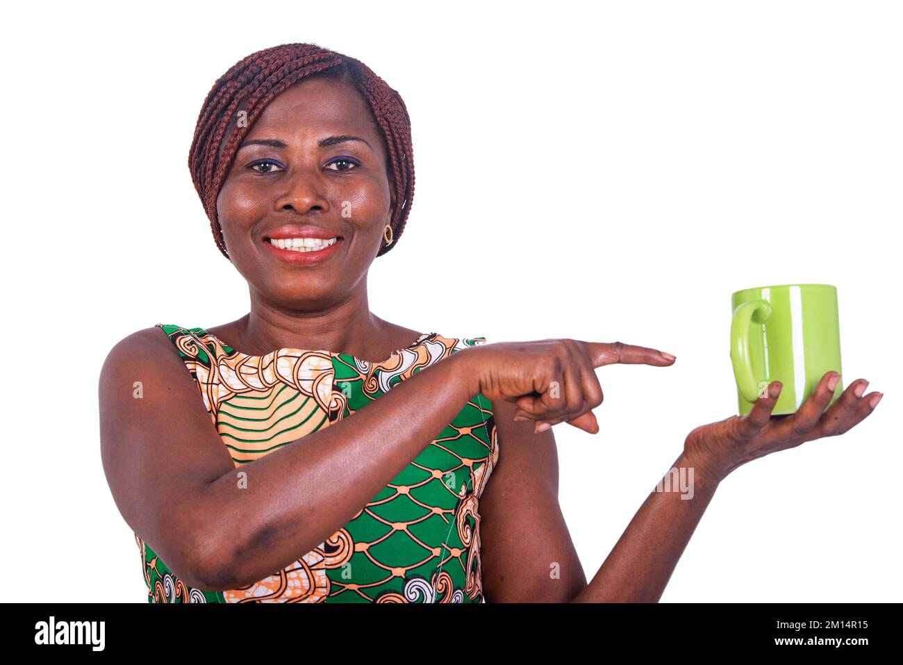 portrait of a beautiful adult woman pointing the finger at a cup of ...