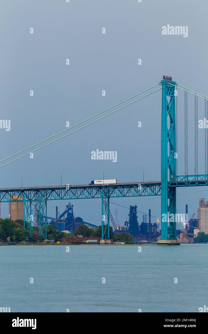 The Detroit River and Ambassador Bridge in Detroit, Michigan, USA. The ...