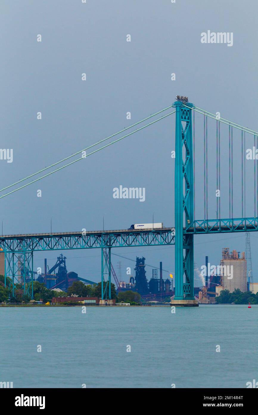 The Detroit River and Ambassador Bridge in Detroit, Michigan, USA. The ...