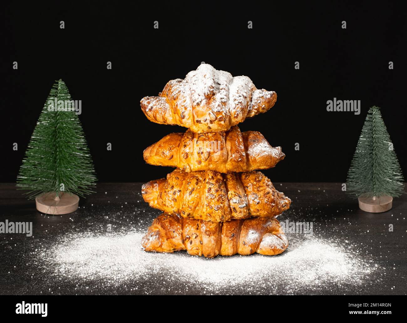 Christmas background with croissants and fir tree Stock Photo - Alamy