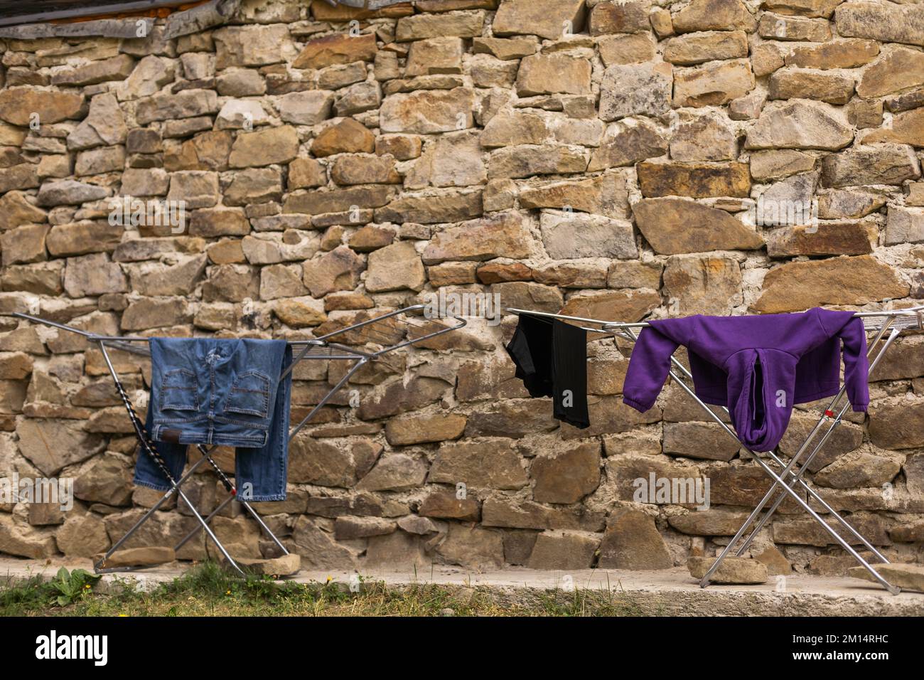 laundry drying outside in the town Stock Photo - Alamy