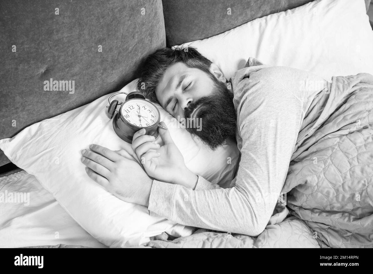 Man sleeping in bed Black and White Stock Photos & Images - Alamy