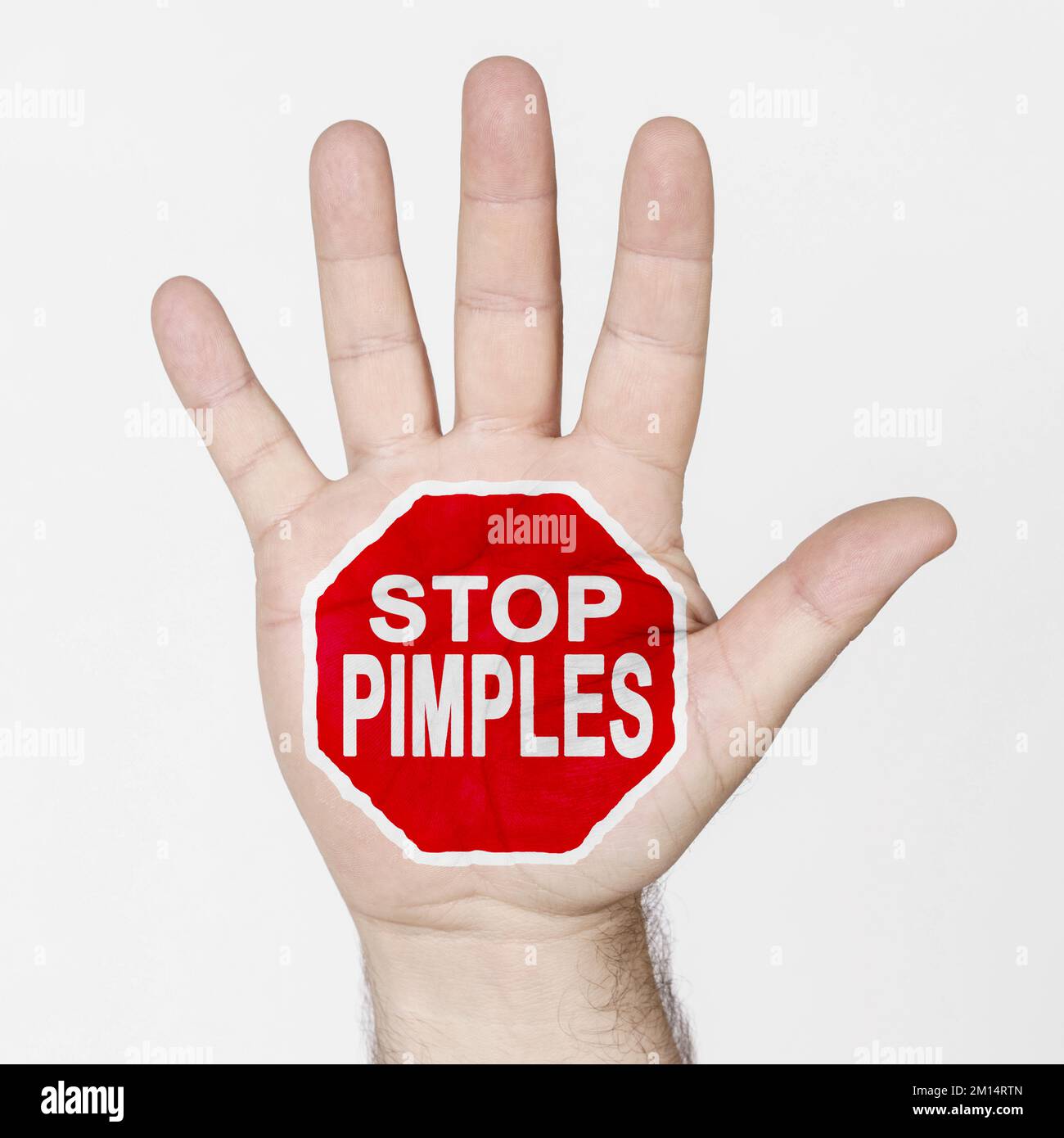 Medicine concept. On the palm of the hand there is a stop sign with the ...
