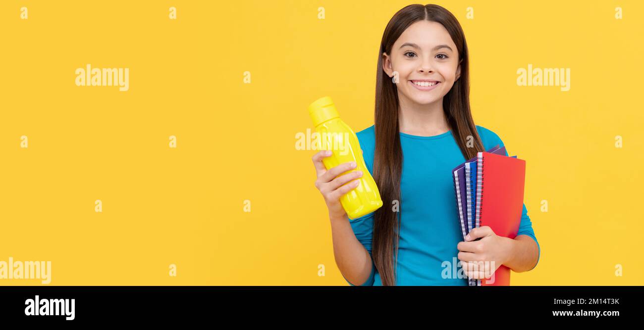 childhood happiness. happy kid going to do homework with notepad ...