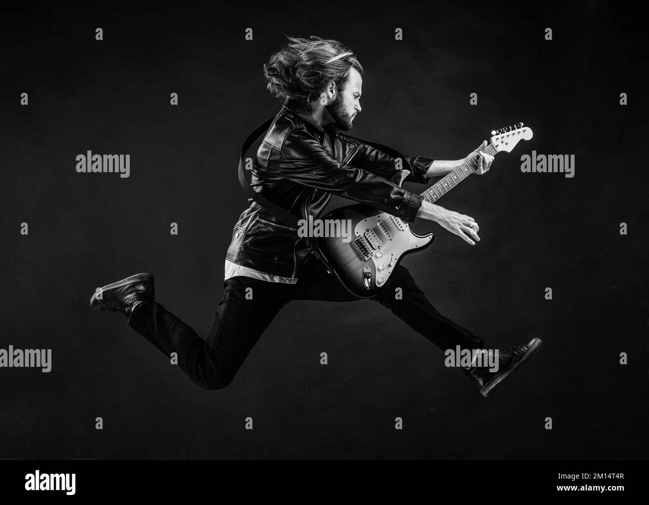 playing rock music. stylish crazy man. string musical instrument Stock ...