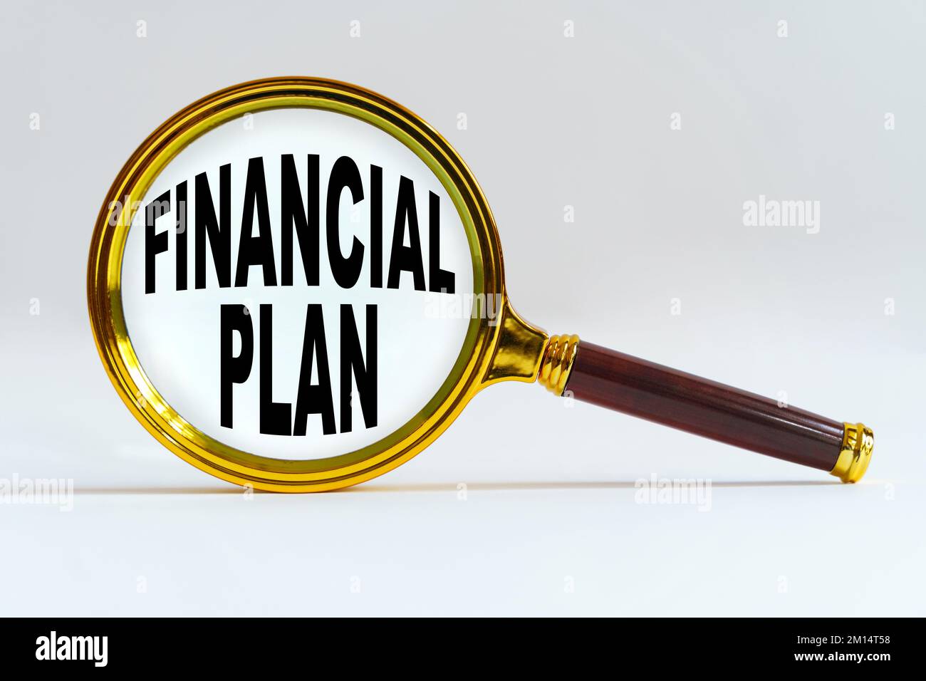 Finance and economics concept. Magnifier on a white background, inside ...