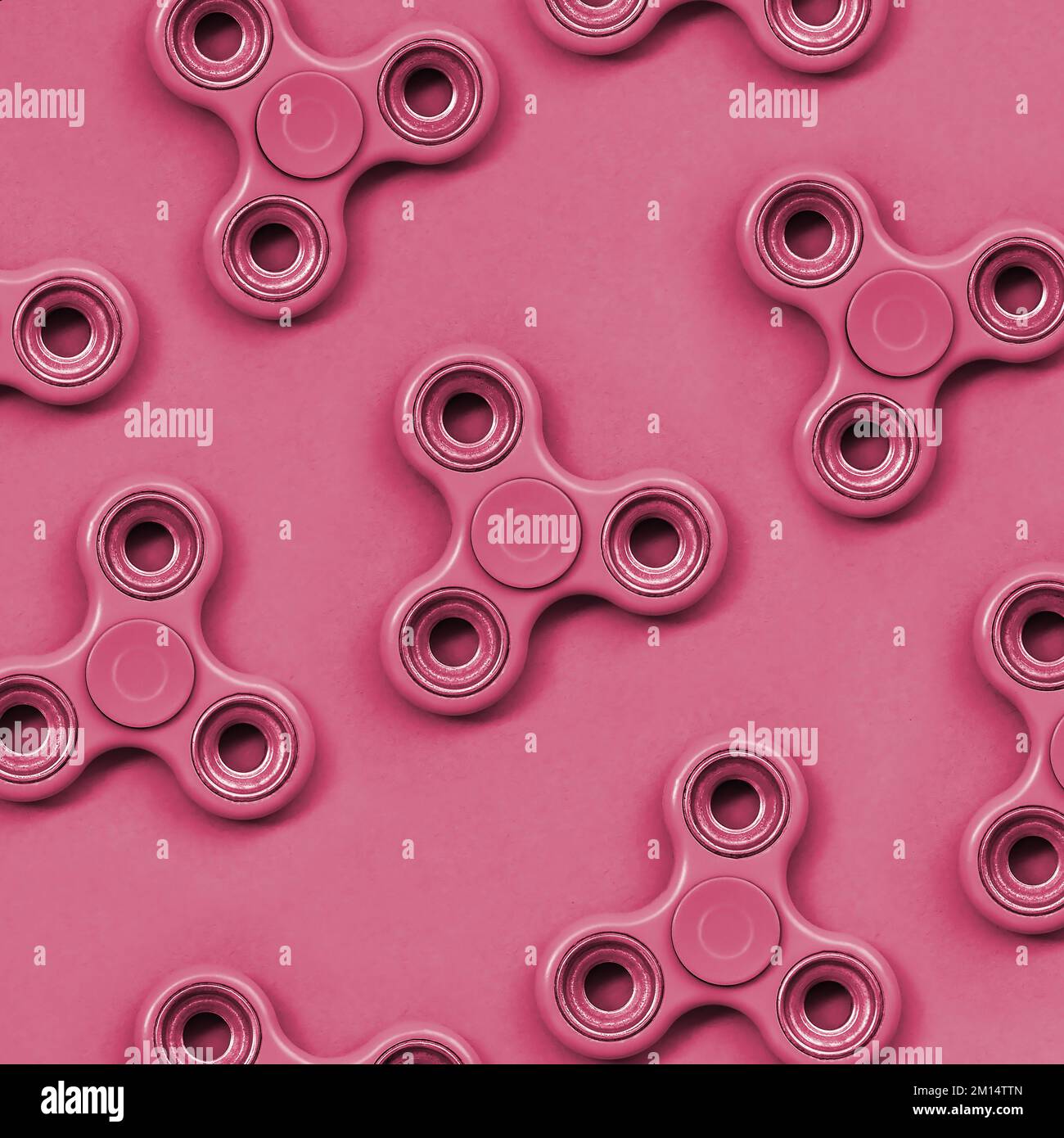 Many green fidget spinners lies on texture background of fashion pastel ...