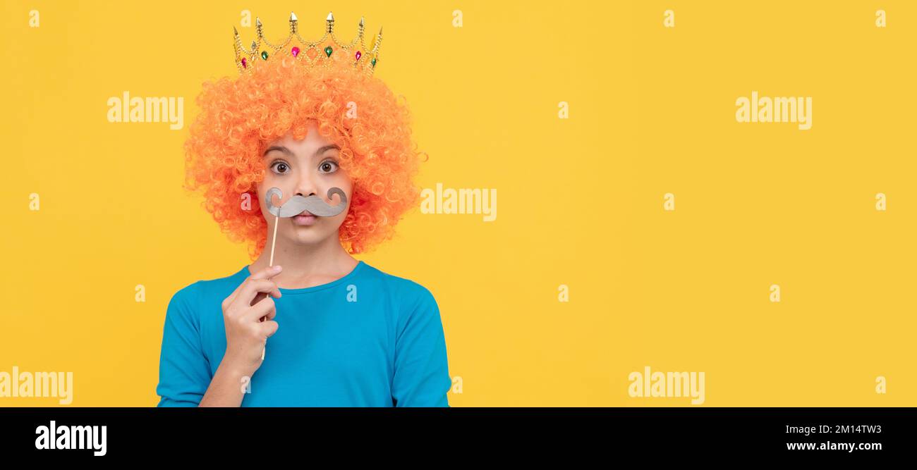 surprised teen girl in fancy clown wig wear queen crown and funny party ...