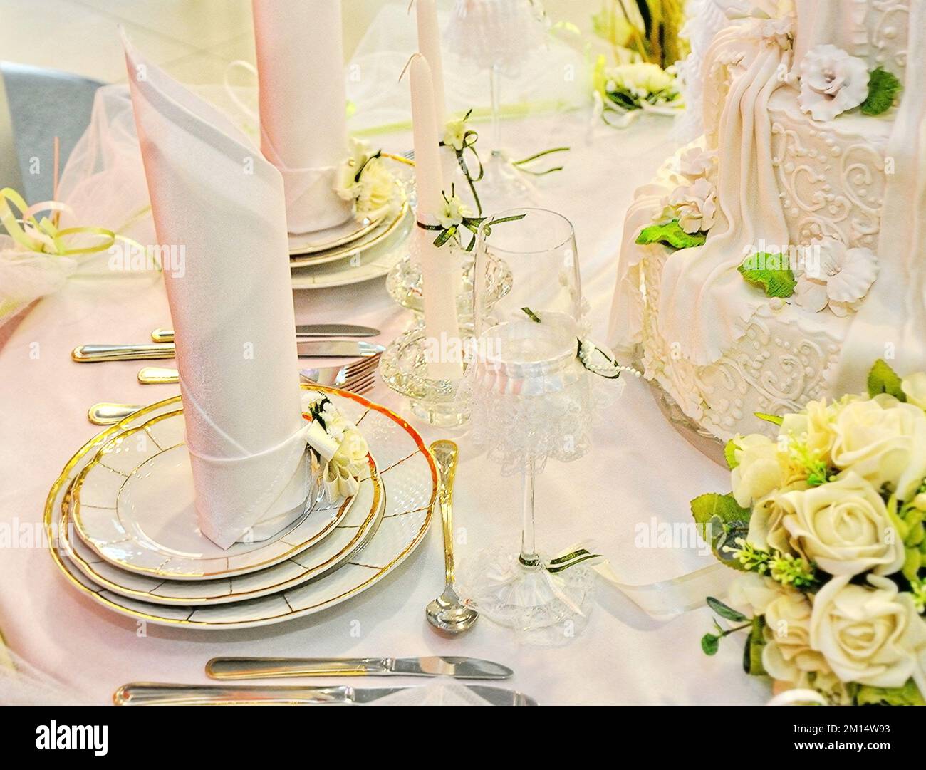 Sponge wedding cake on the table of the bride and groom Stock Photo - Alamy