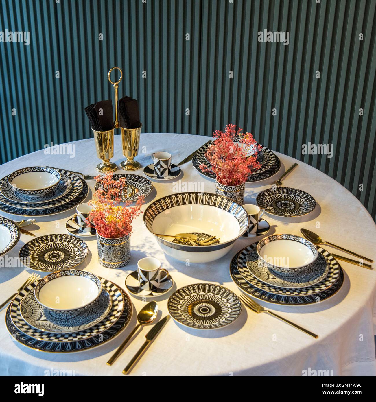 luxury plate sets in the dining room decoration Stock Photo - Alamy
