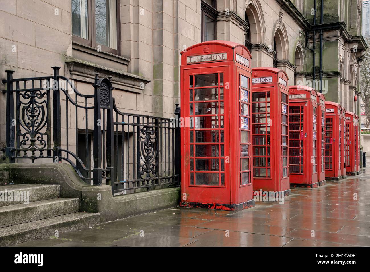 Old red telephone boxes on the street. Taken in Preston, Lancashire, UK ...