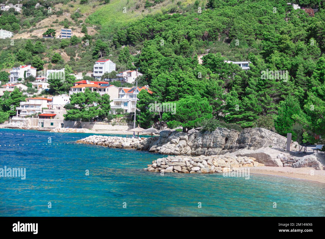 Green tropical coast and sea . Tourist resort at seaside . Awesome ...