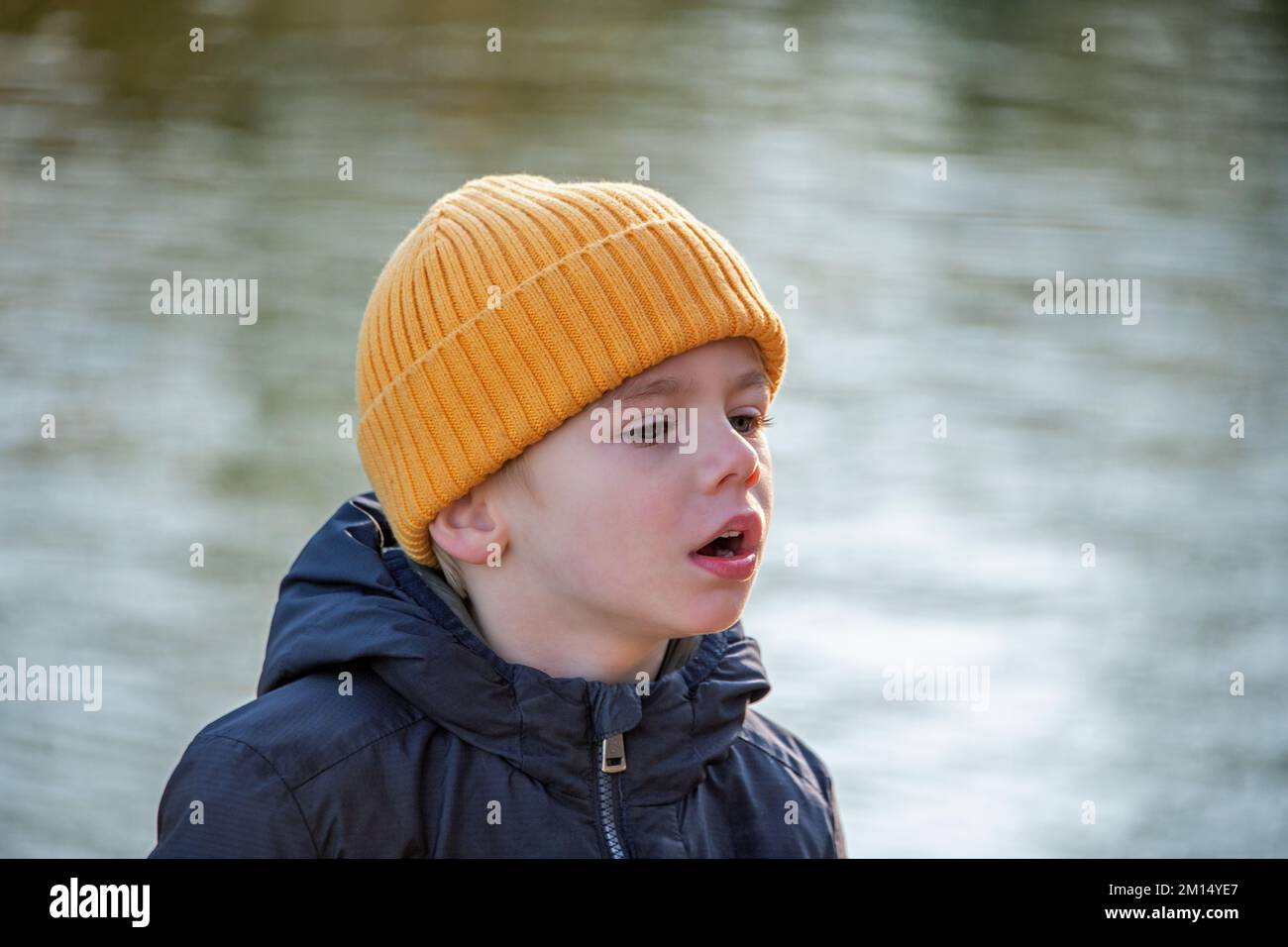 Near view of a young child at the playground on a sunny day Stock Photo ...