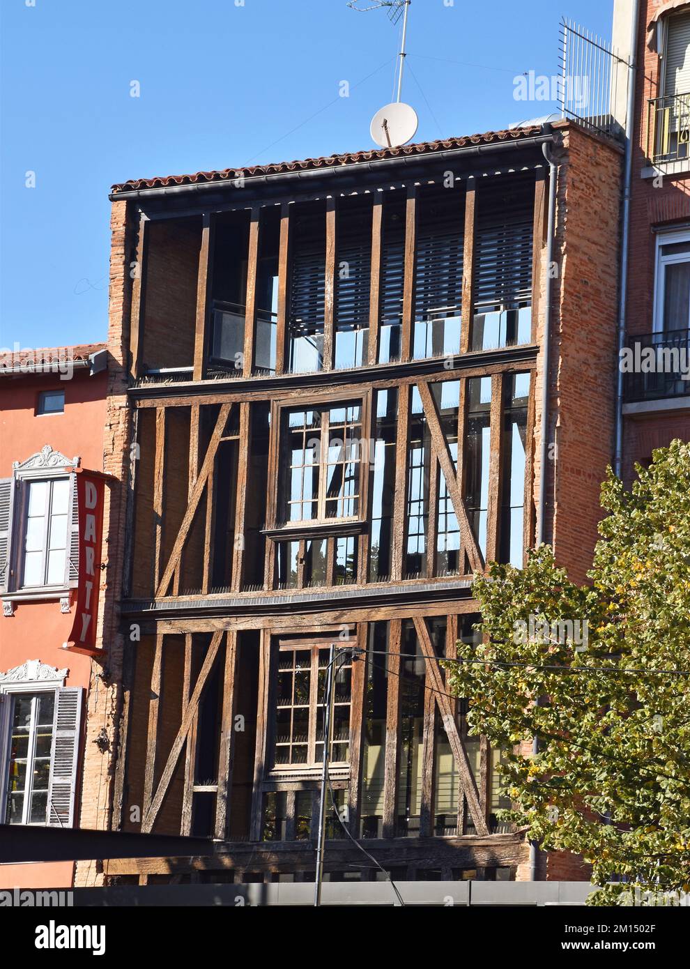 Old House in Toulouse, France, with its original cladding removed ...