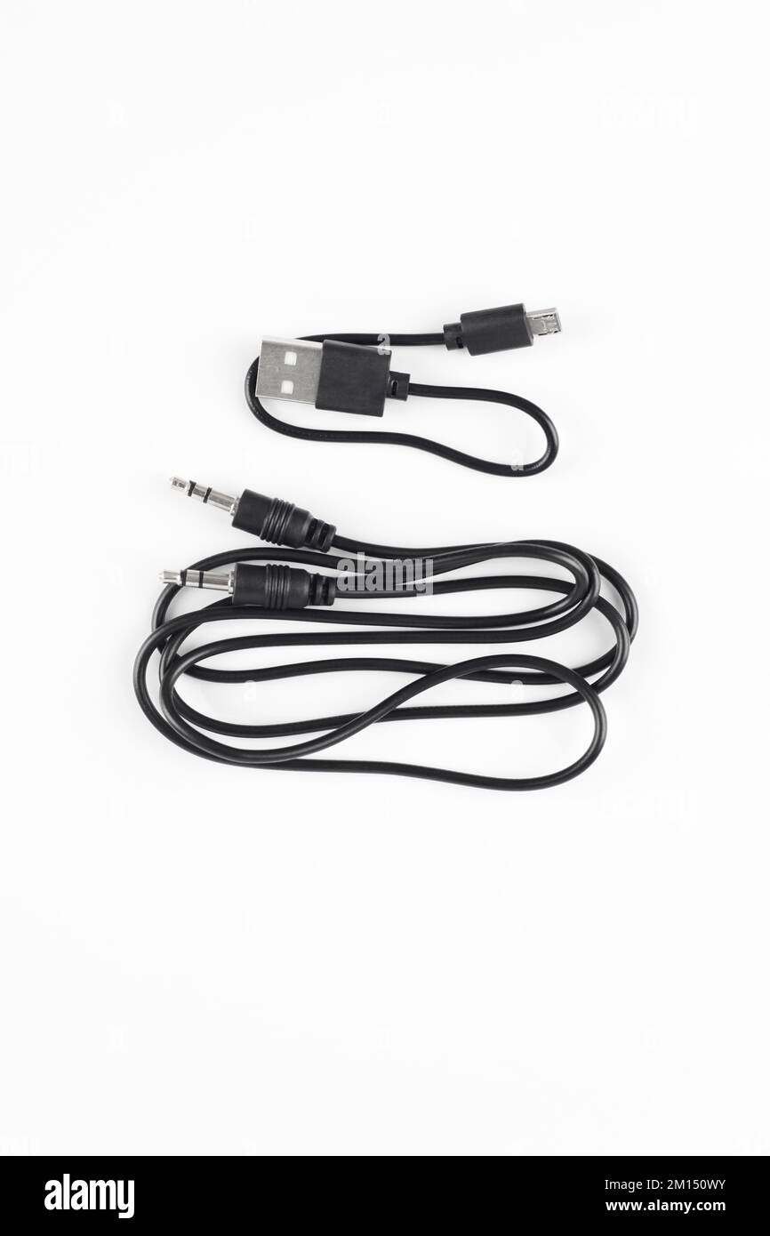 USB and audio cables isolated on white background. Audio jack cable ...