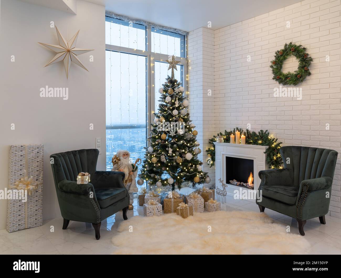 Christmas tree, gifts. Decorated fireplace. Wreath on wall. Interior ...