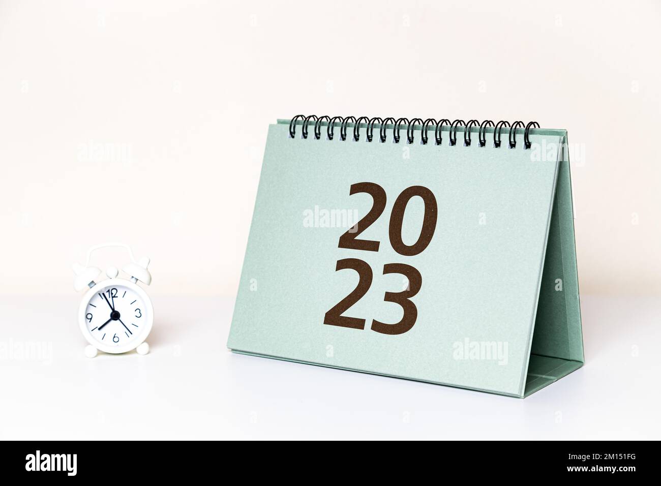 2023 calendar and small clock on white background isolated Stock Photo ...