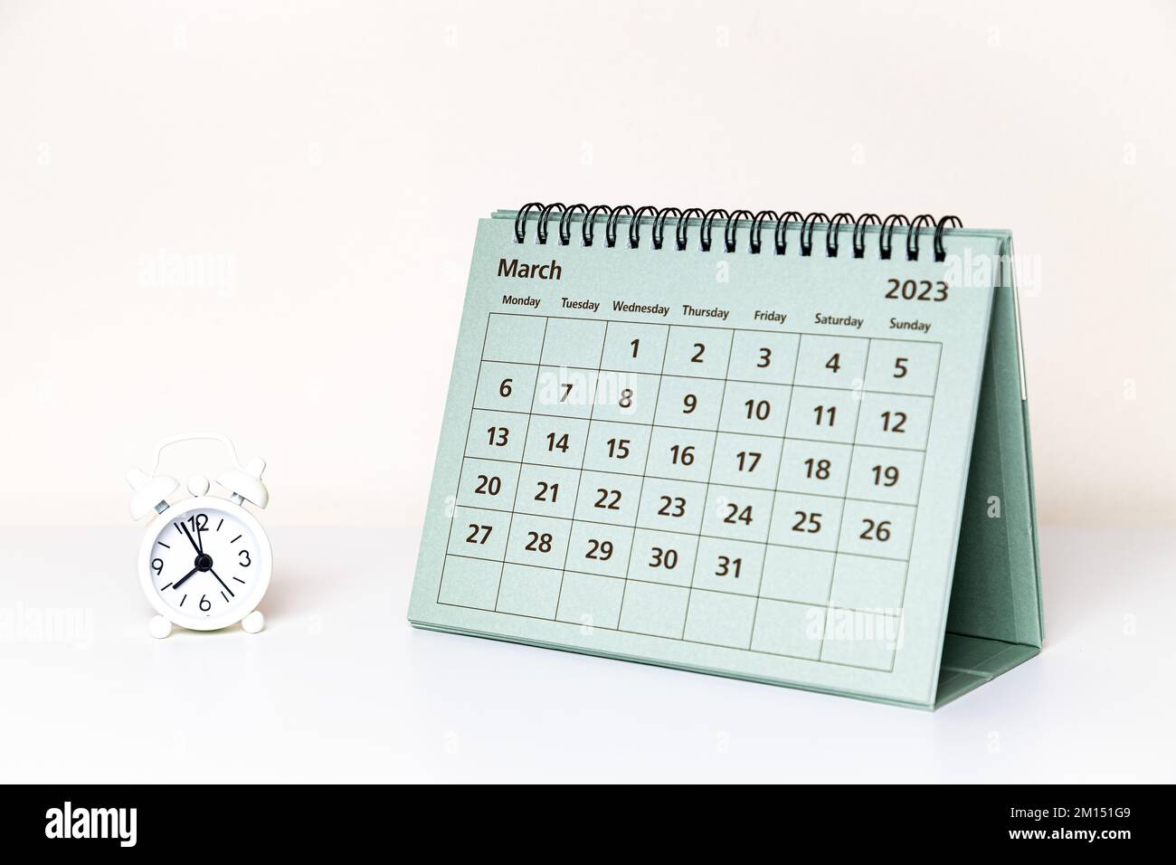 March 2023 calendar and small clock on white background isolated Stock ...