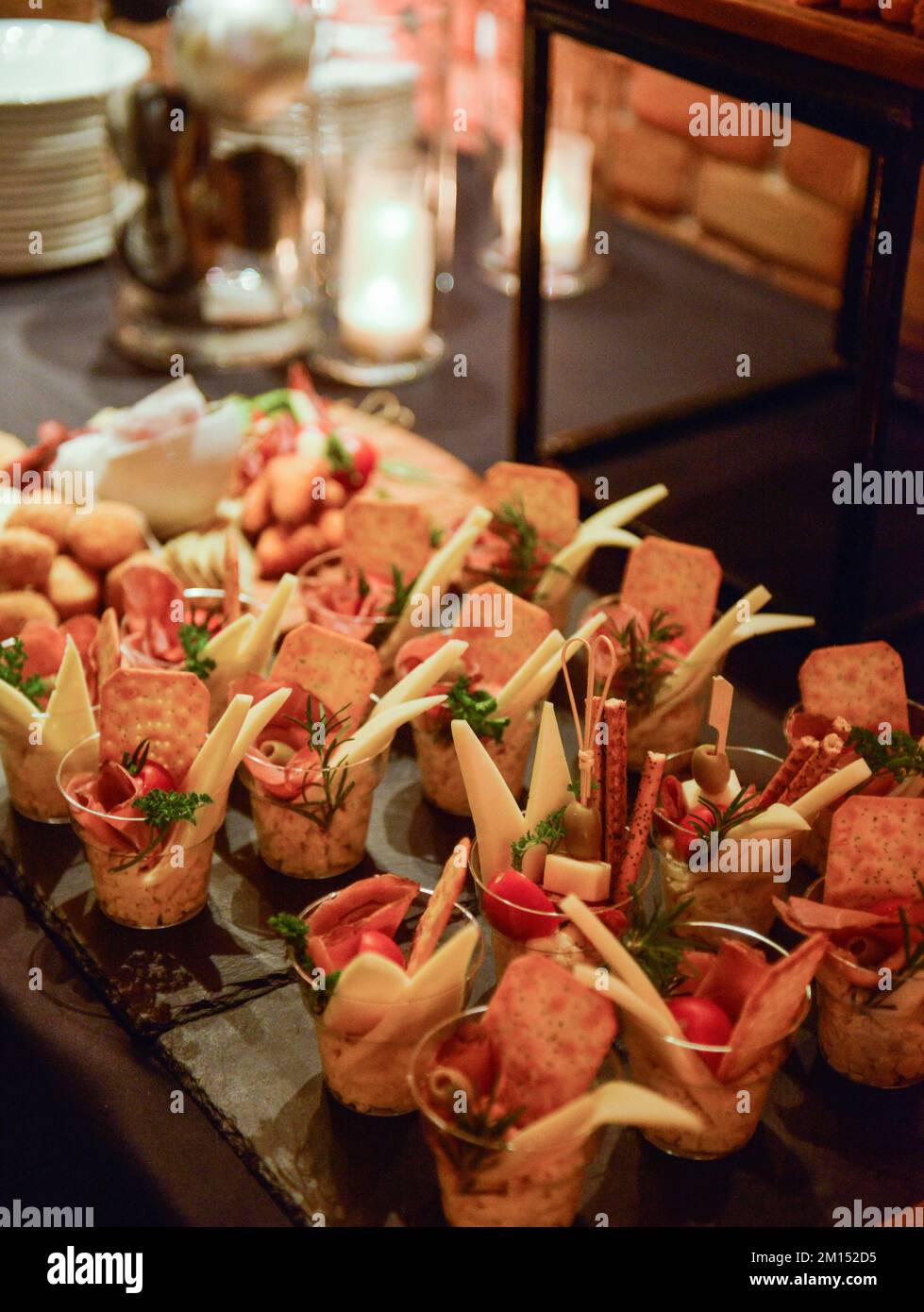 The buffet at the reception. Assortment of well decorated gourmet food ...