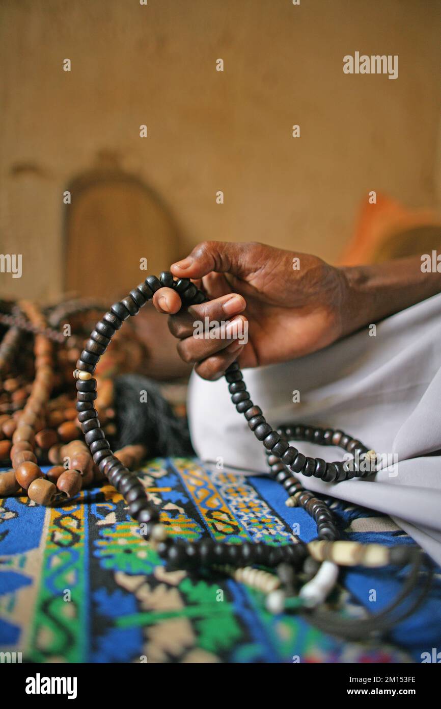 hands holding misbaha Stock Photo - Alamy