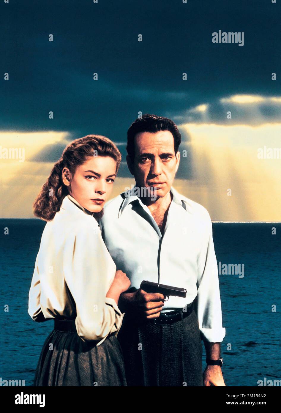 LAUREN BACALL and HUMPHREY BOGART in KEY LARGO (1948), directed by JOHN ...