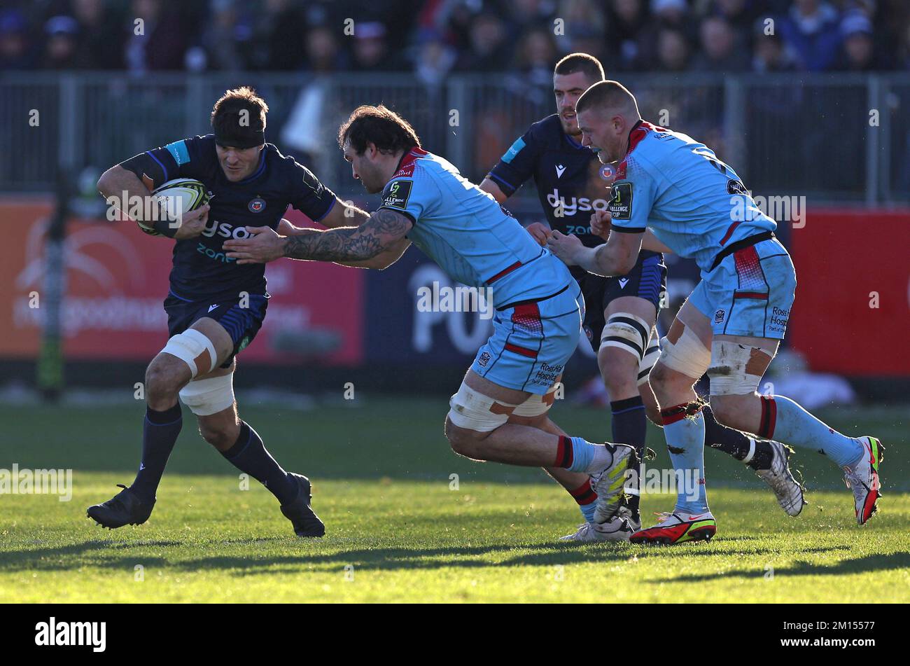 Bath Rugby's Josh Bayliss (left) attempts to break free from pressure ...