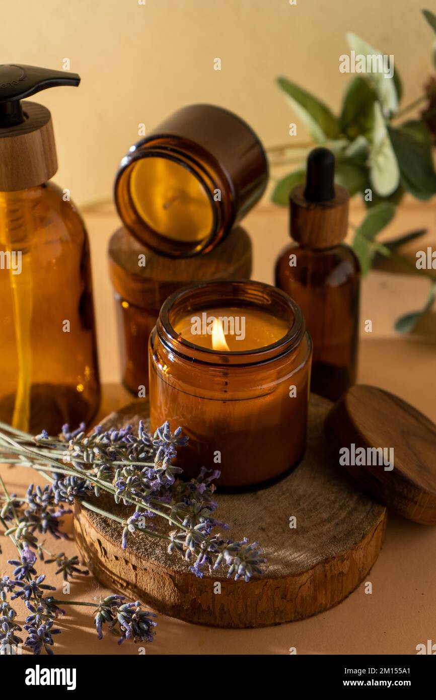 Soy candles in a glass jar. Aromatherapy. Burning candle and lavender ...