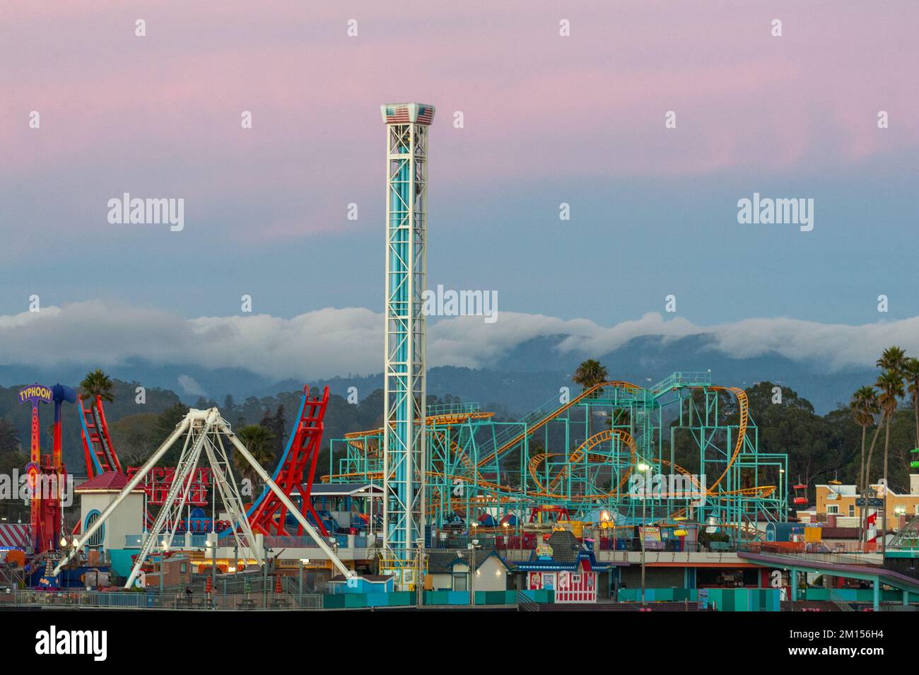 Santa Cruz, Ca - January 6, 2022. A deep pink sky is visible behind the ...