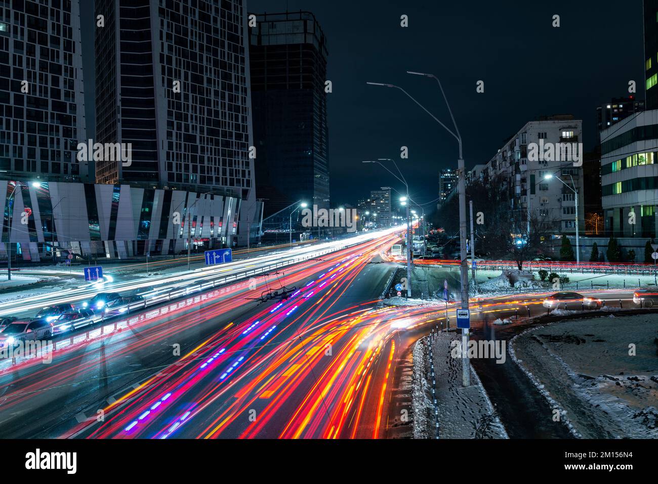 Night city traffic in Kyiv, Ukraine. Car light trails on the dark ...