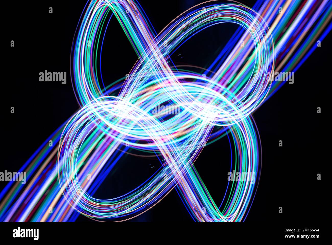 Infinity sign, drawing by light, flash of light in infinity Stock Photo ...