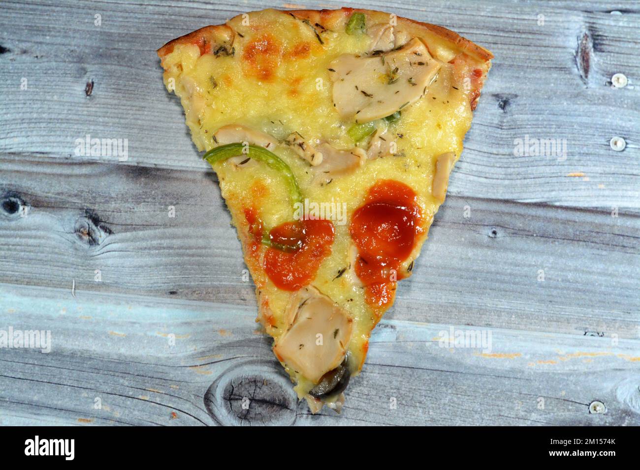 Chicken barbecue pizza with toppings of pieces of chicken, salami ...