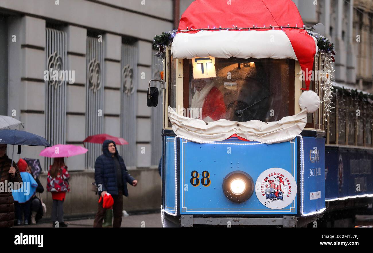 Zagreb, Croatia. 10th Dec, 2022. The Christmas tram seen drives through ...