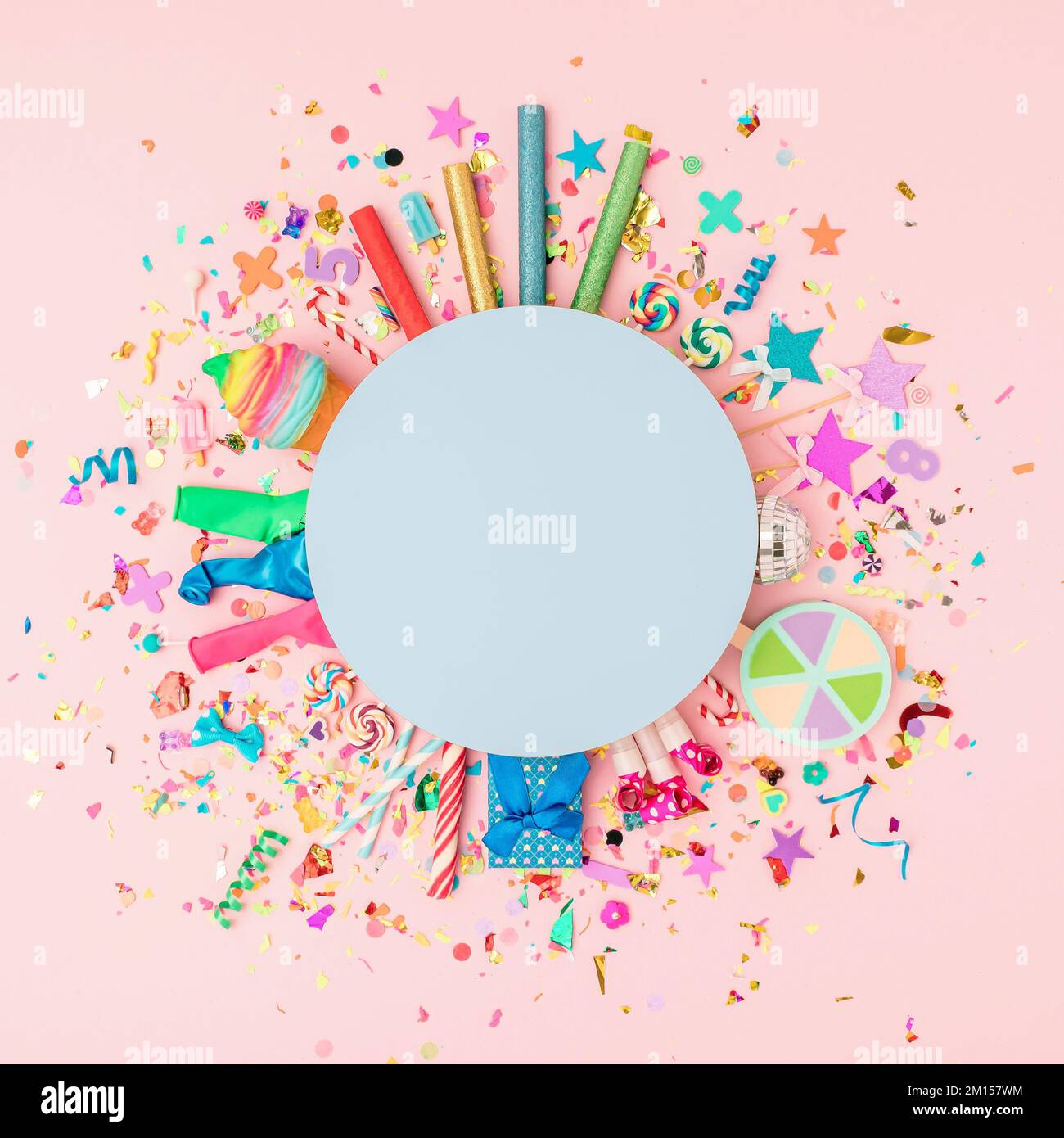 A colorful celebration background with party confetti on pink ...