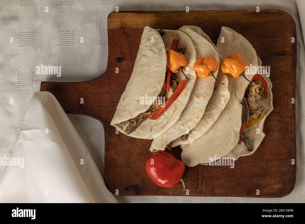 Top view of Tacos, typical Mexican food, with beef, vegetables and ...
