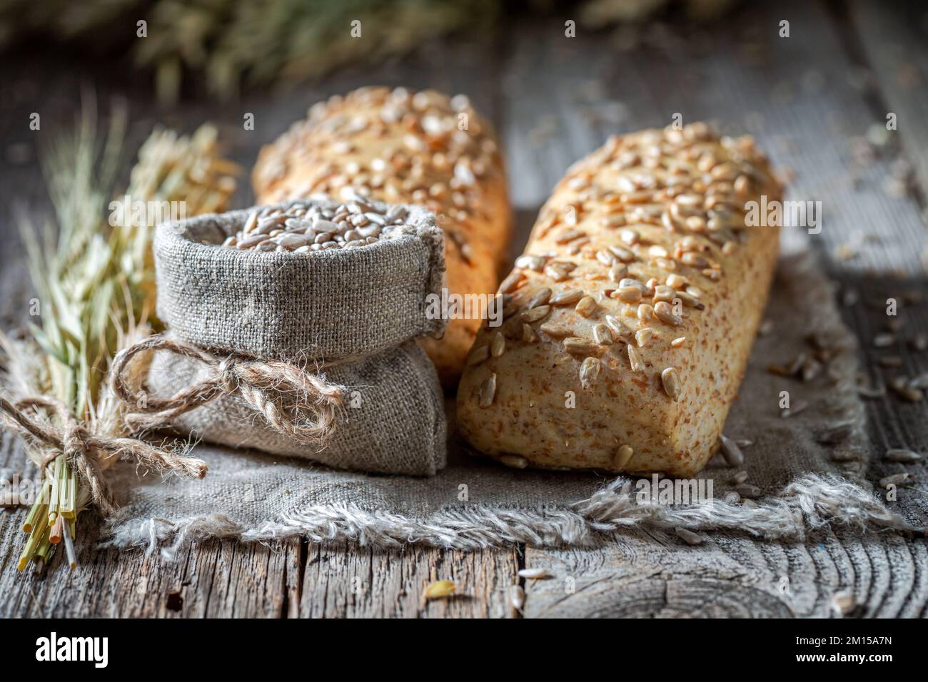 Delicious and hot oat buns with bran and grains. Group of many buns ...