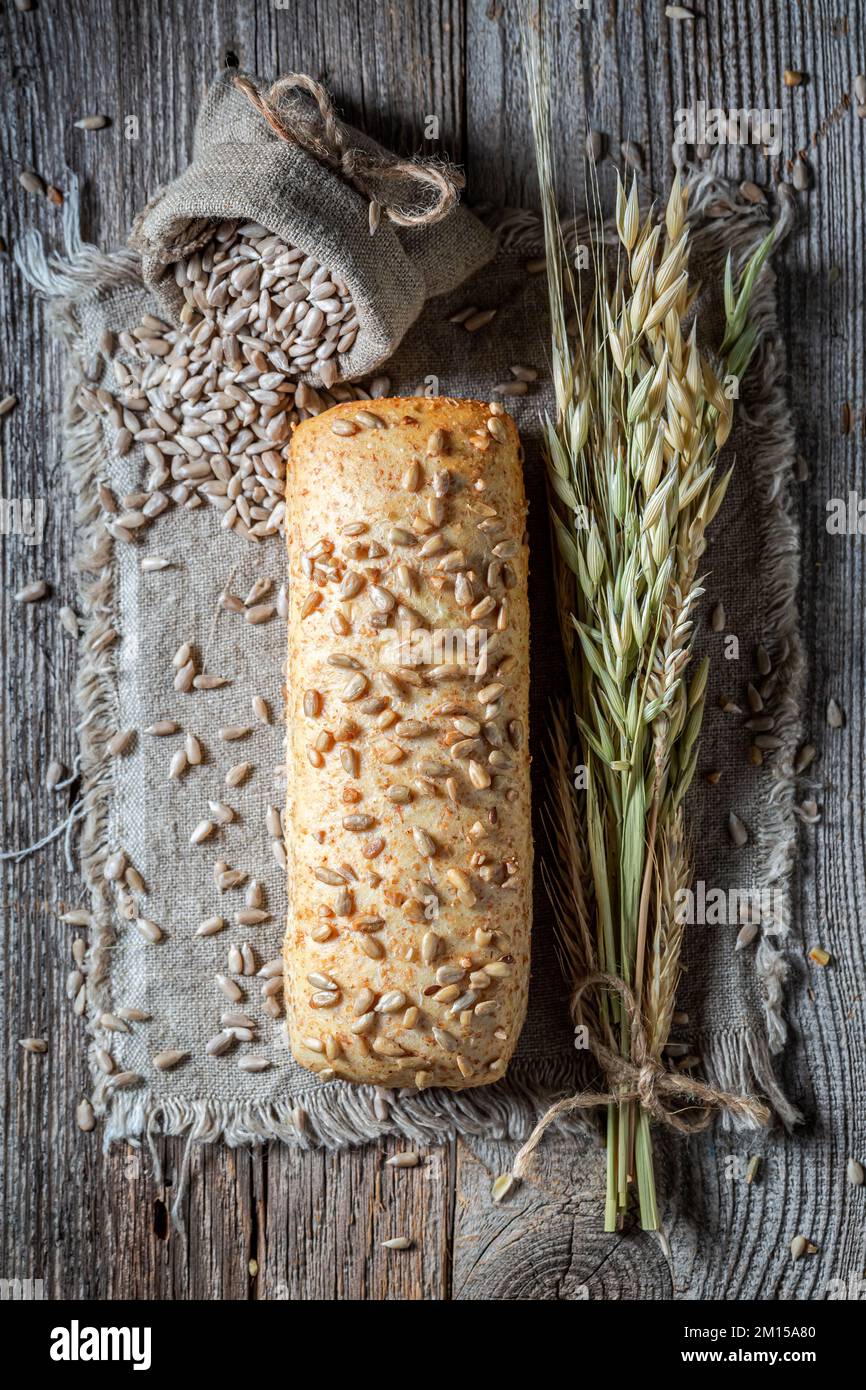 Healthy and wholegrains oat buns from their own bakery. Group of many ...