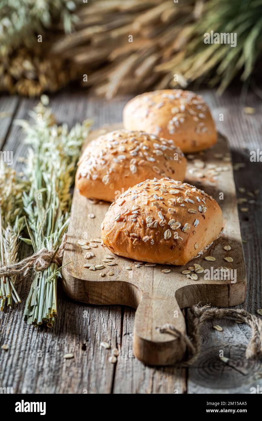 Healthy and wholegrains oat buns baked at home. Group of many buns ...