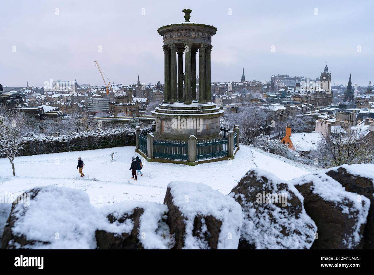 View of skyline of Edinburgh from Calton Hill in winter snow, Edinburgh ...