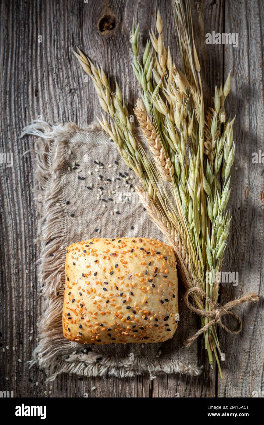 Healthy and wholegrains oat buns baked in bakery. Group of many buns ...