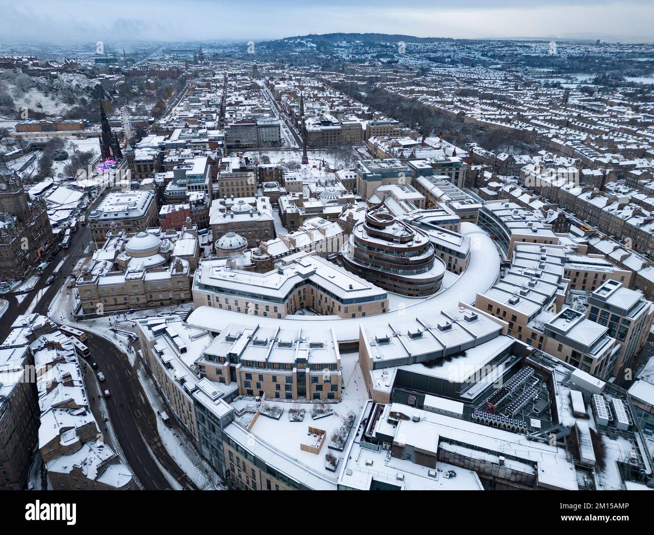Aerial view of Edinburgh rooftops and St James Quarter in the snow ...