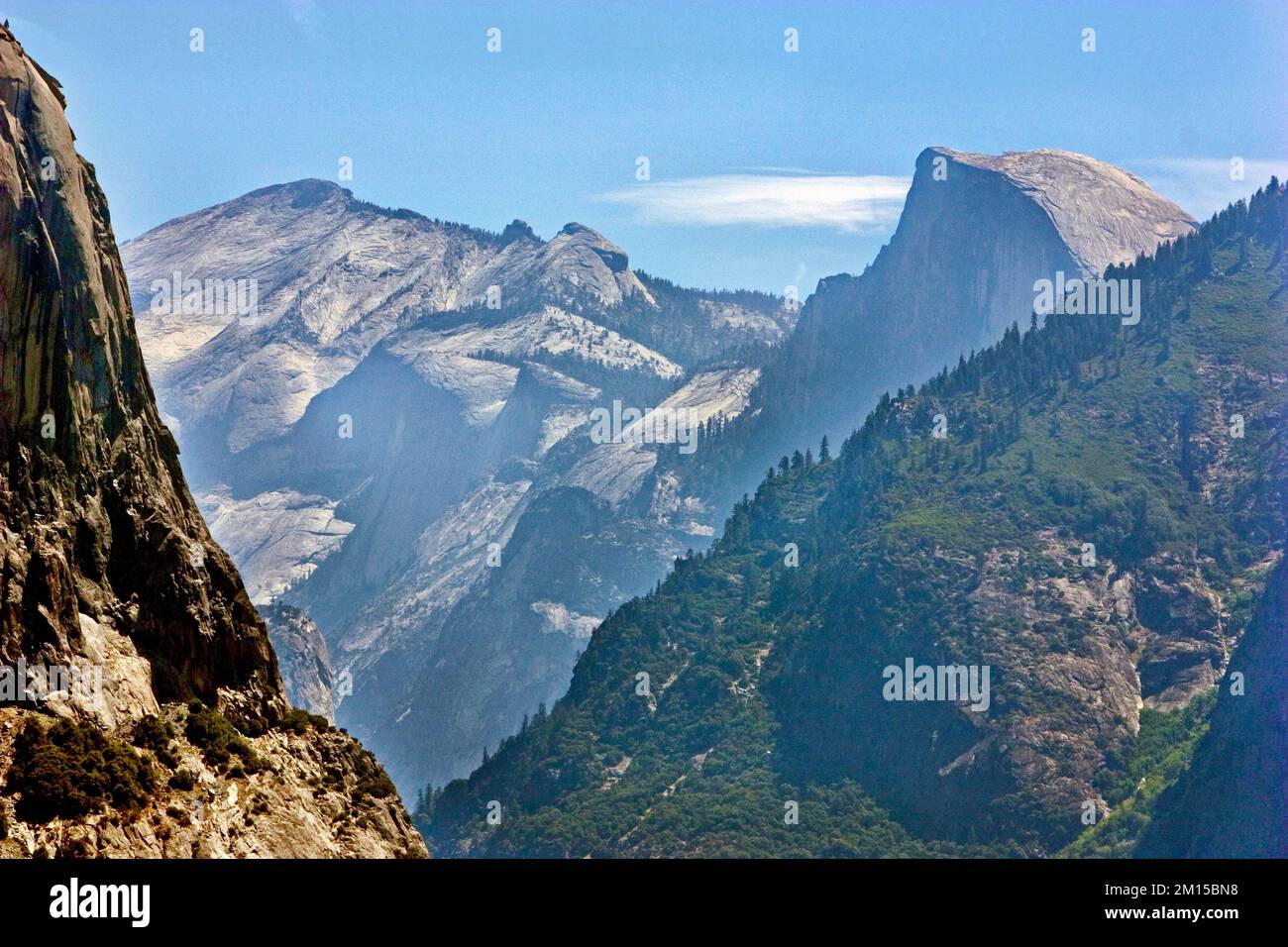 An aerial view of a mountain peak, and rocky mountain slope covered by ...